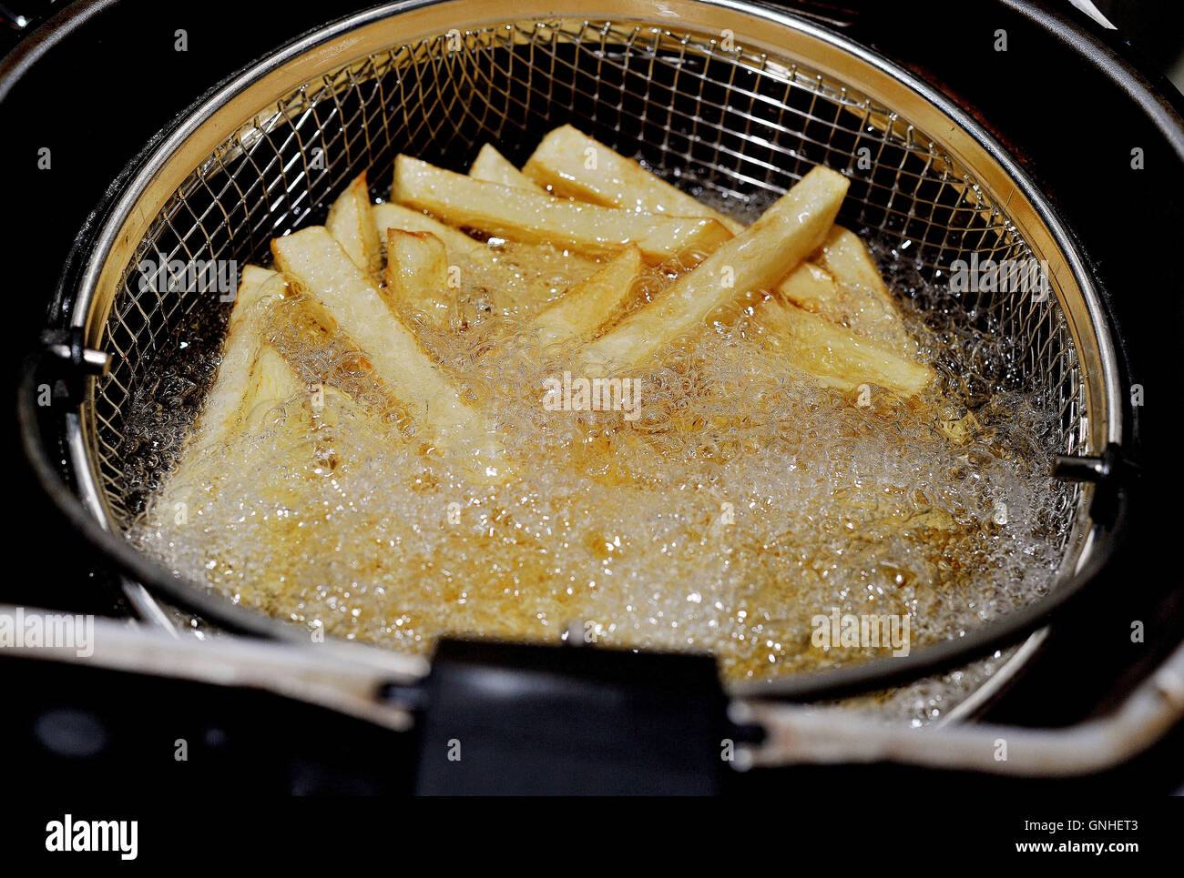 Deep fat fire hi-res stock photography and images - Alamy