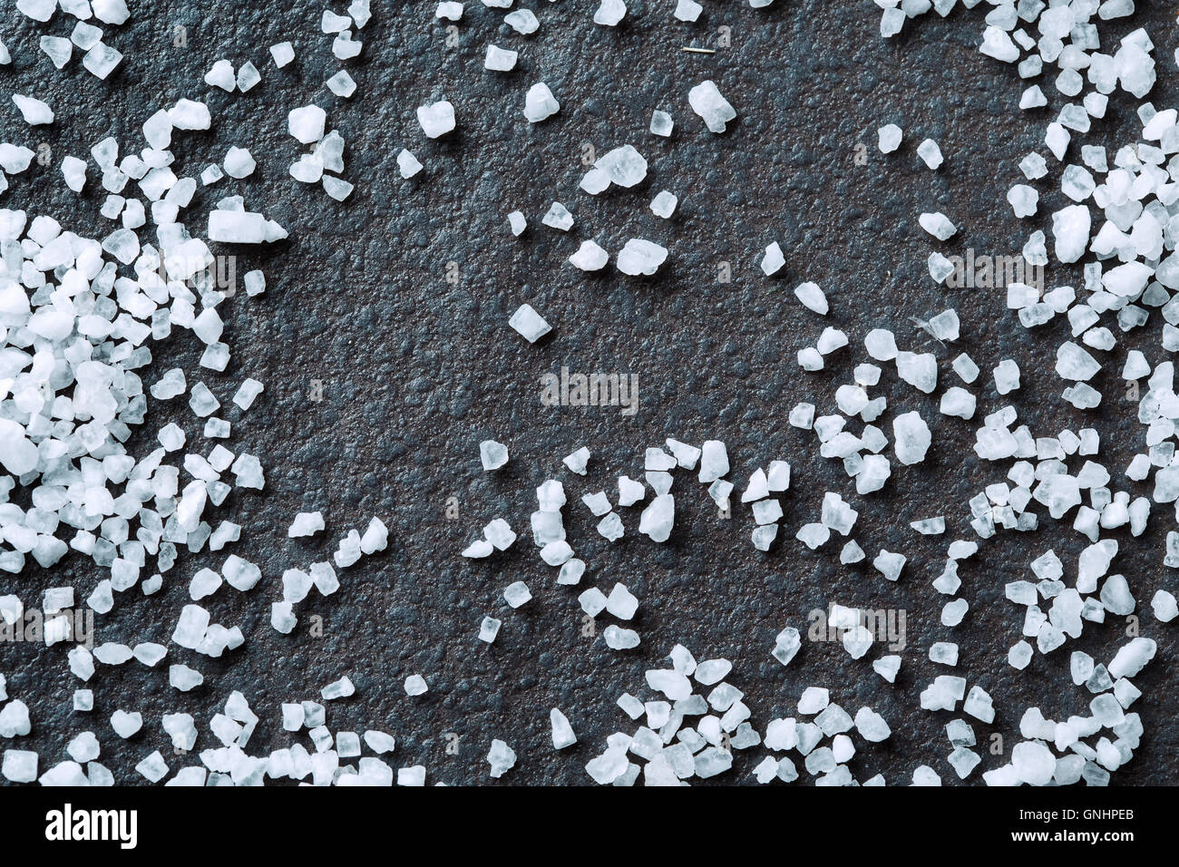 Background with salt grains close-up on stone Stock Photo - Alamy
