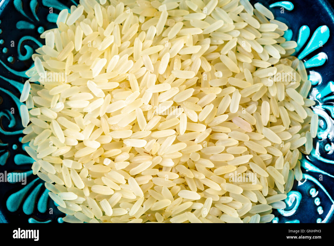 Food background, rice close-up in ethnic bowl Stock Photo - Alamy