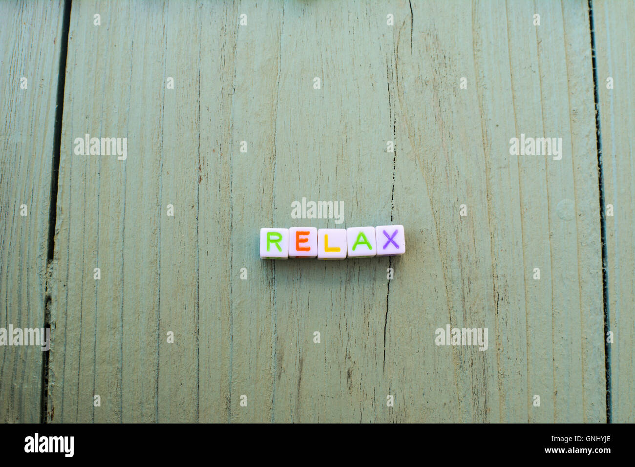 word relax on the wooden background Stock Photo - Alamy