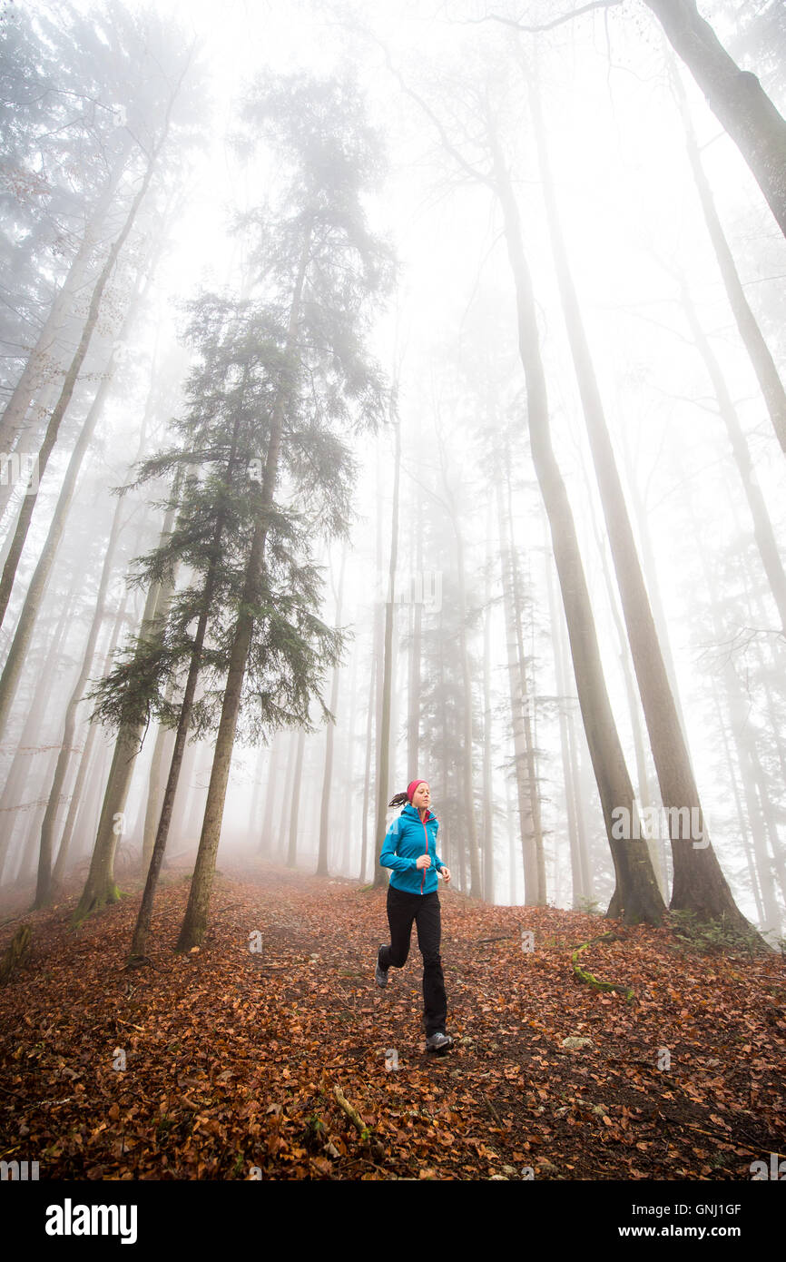 Running through the forest hi-res stock photography and images - Alamy