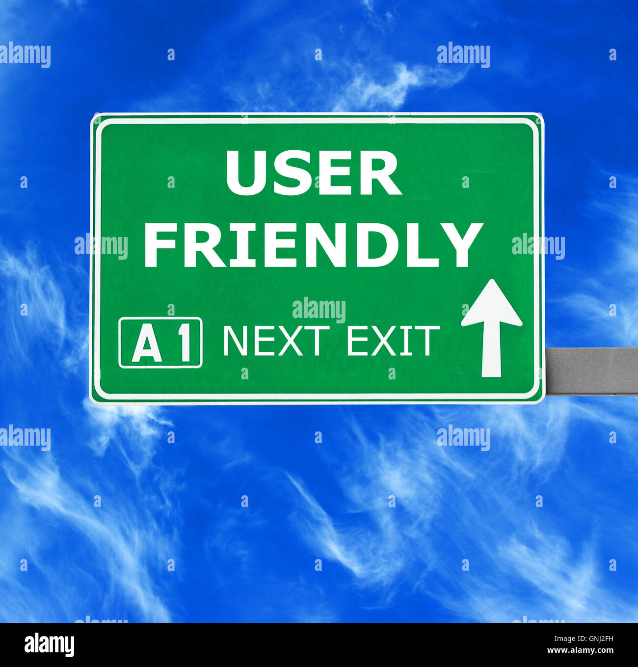 USER FRIENDLY road sign against clear blue sky Stock Photo - Alamy