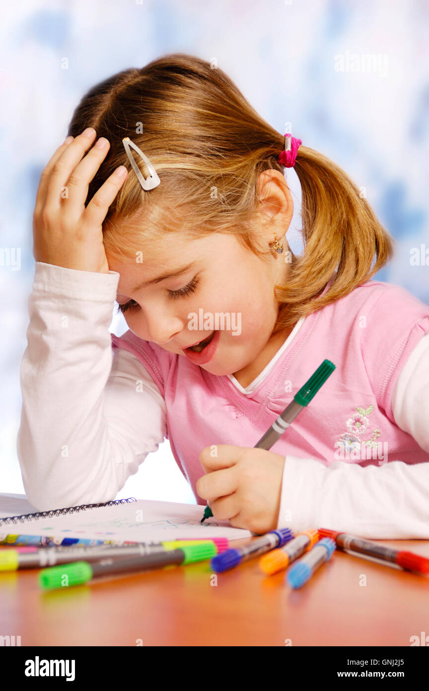 first grade girl doing homework Stock Photo - Alamy