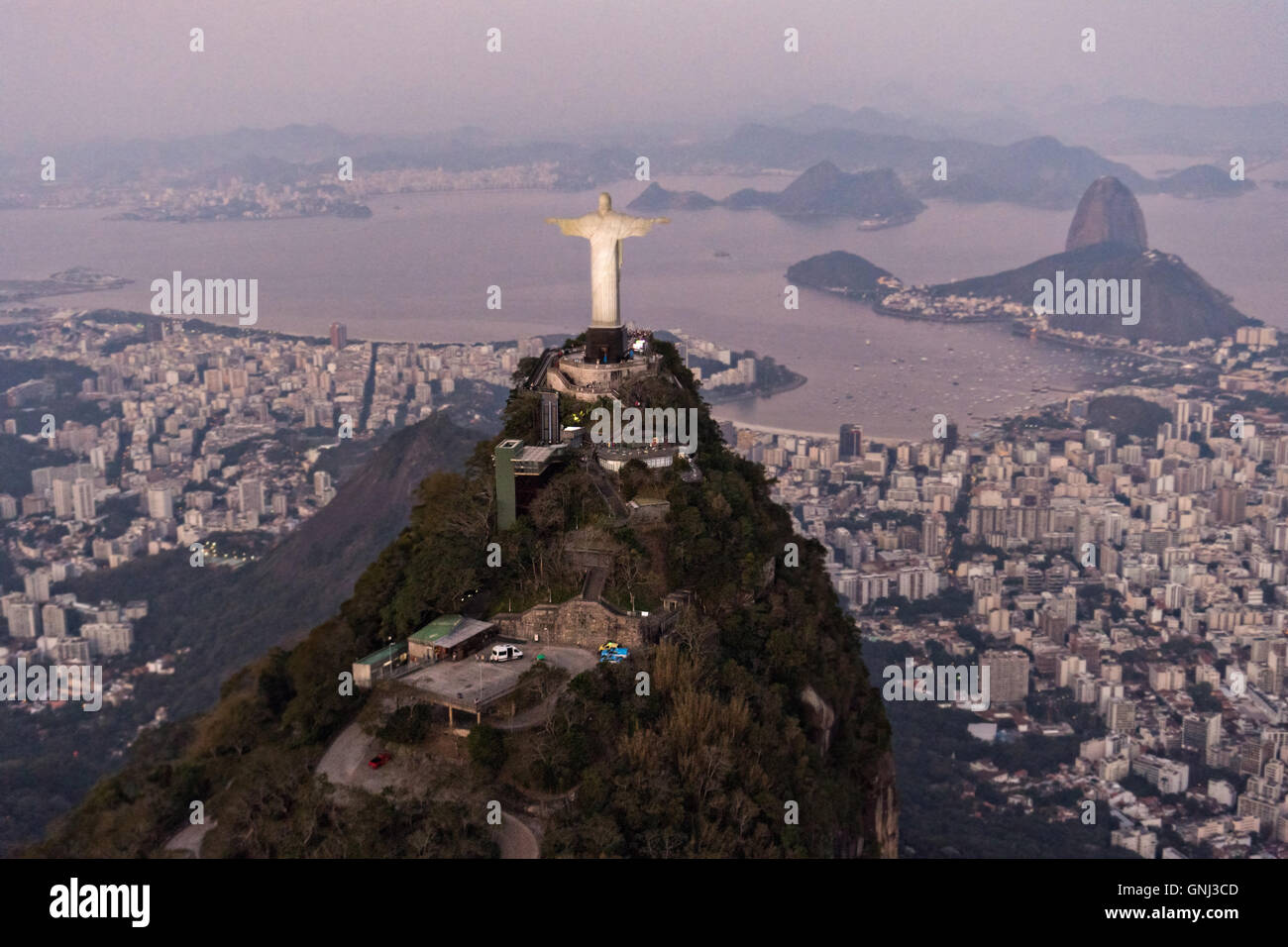 Christ the Redeemer statue at sunset on Corcovado Mountain in Rio de ...
