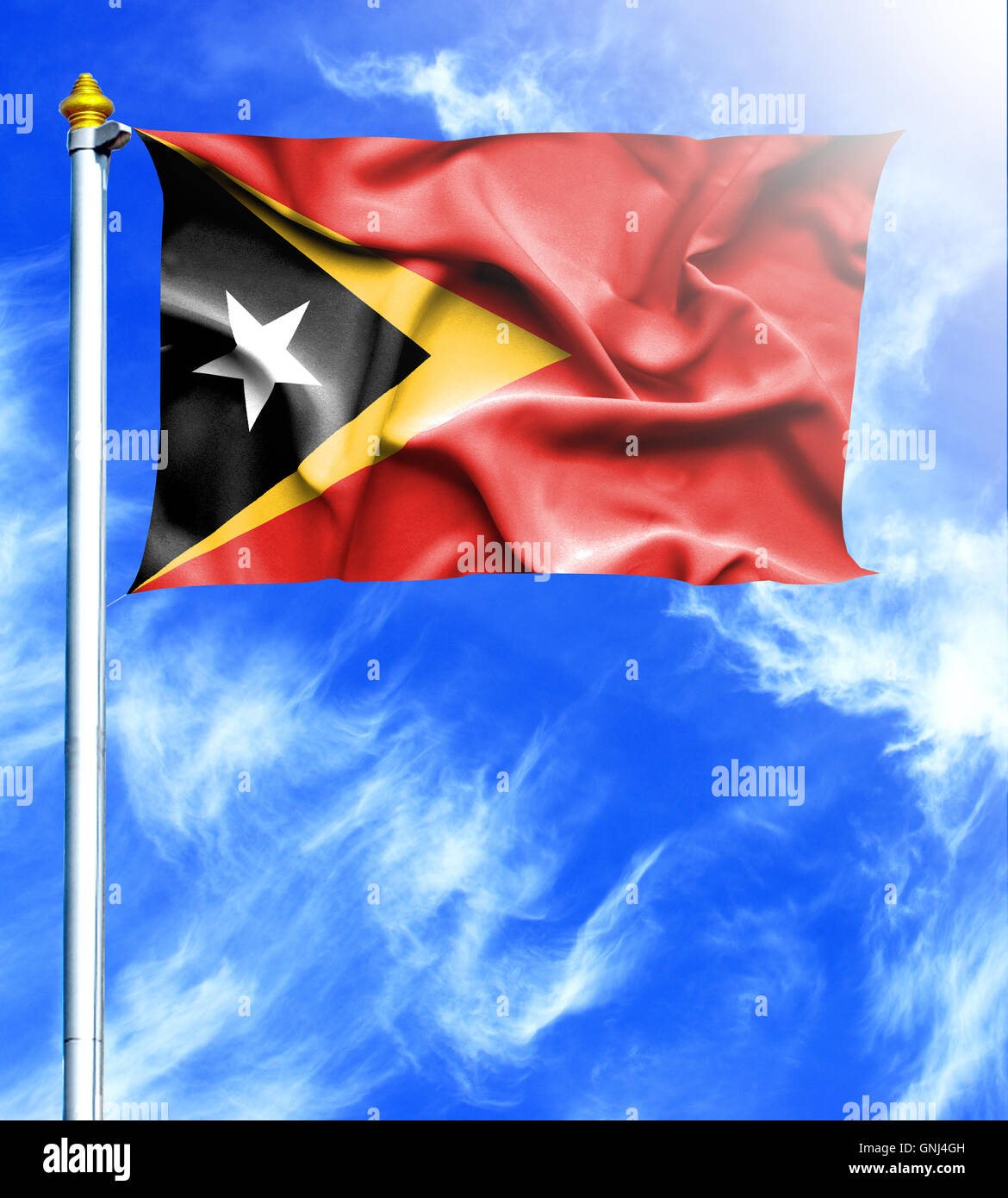Blue sky and mast with hanged waving flag of East Timor Stock Photo - Alamy