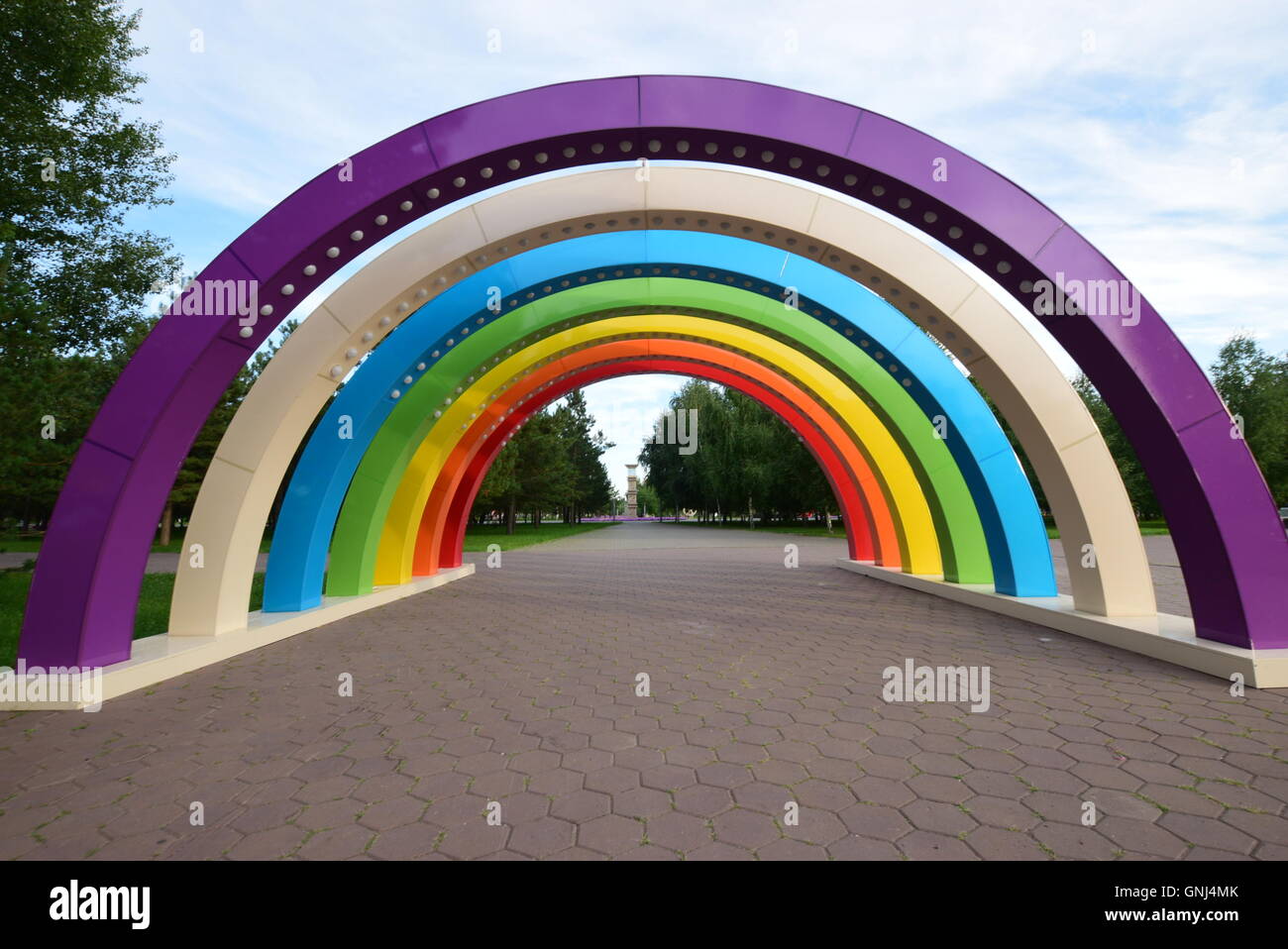 Street decoration in the form of colourful arches Stock Photo - Alamy