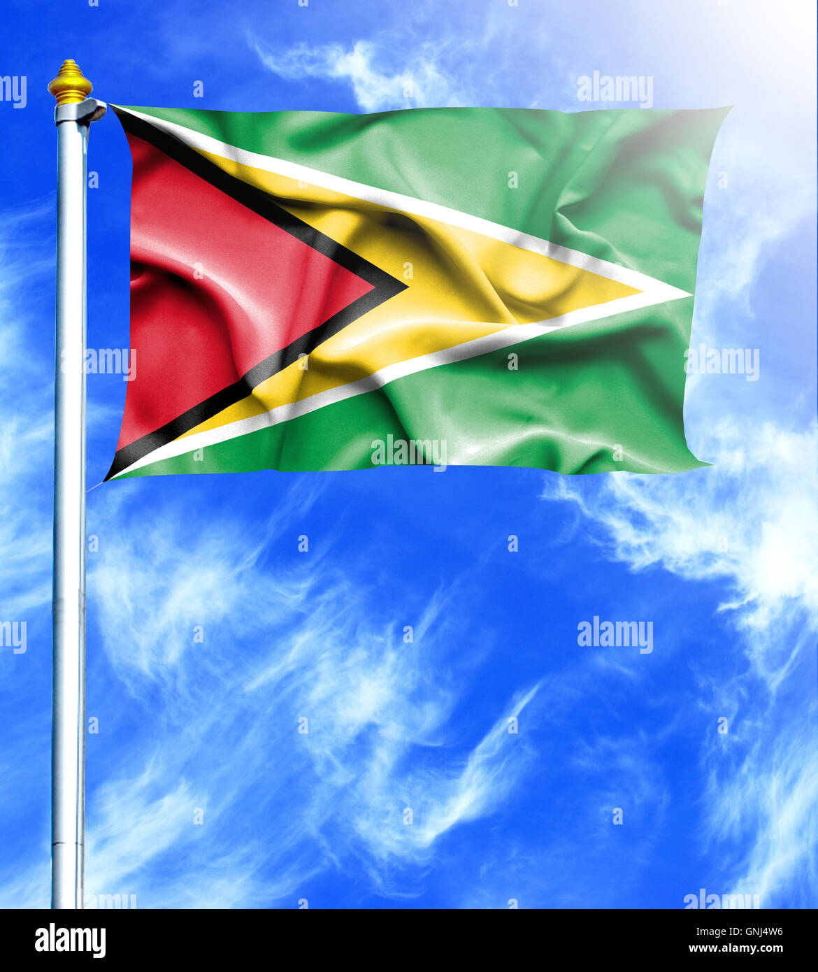 Blue sky and mast with hanged waving flag of Guyana Stock Photo - Alamy