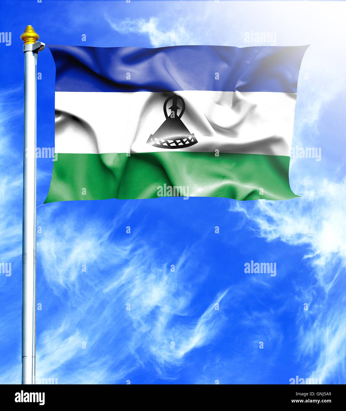 Blue sky and mast with hanged waving flag of Lesotho Stock Photo - Alamy