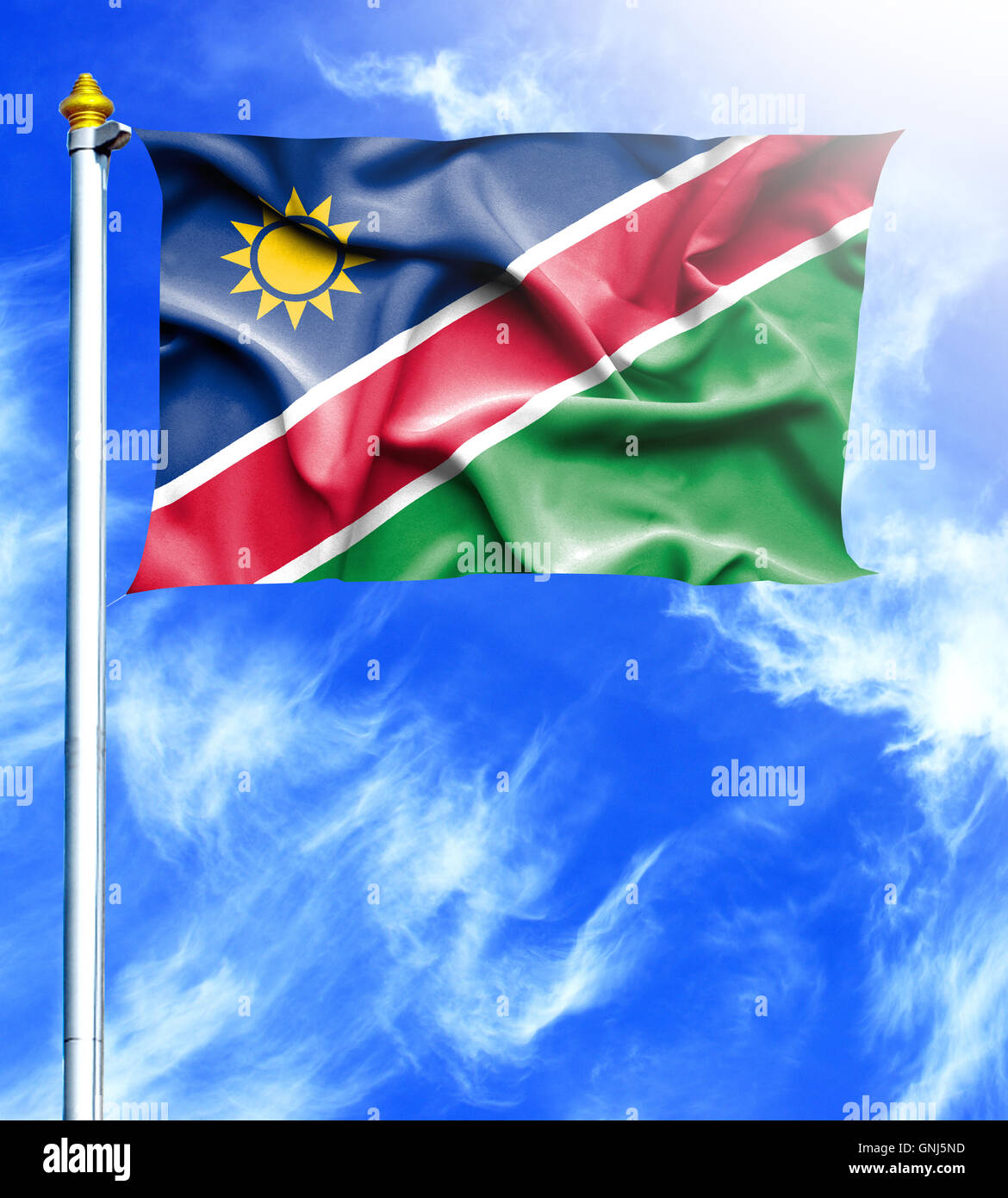 Blue sky and mast with hanged waving flag of Namibia Stock Photo - Alamy