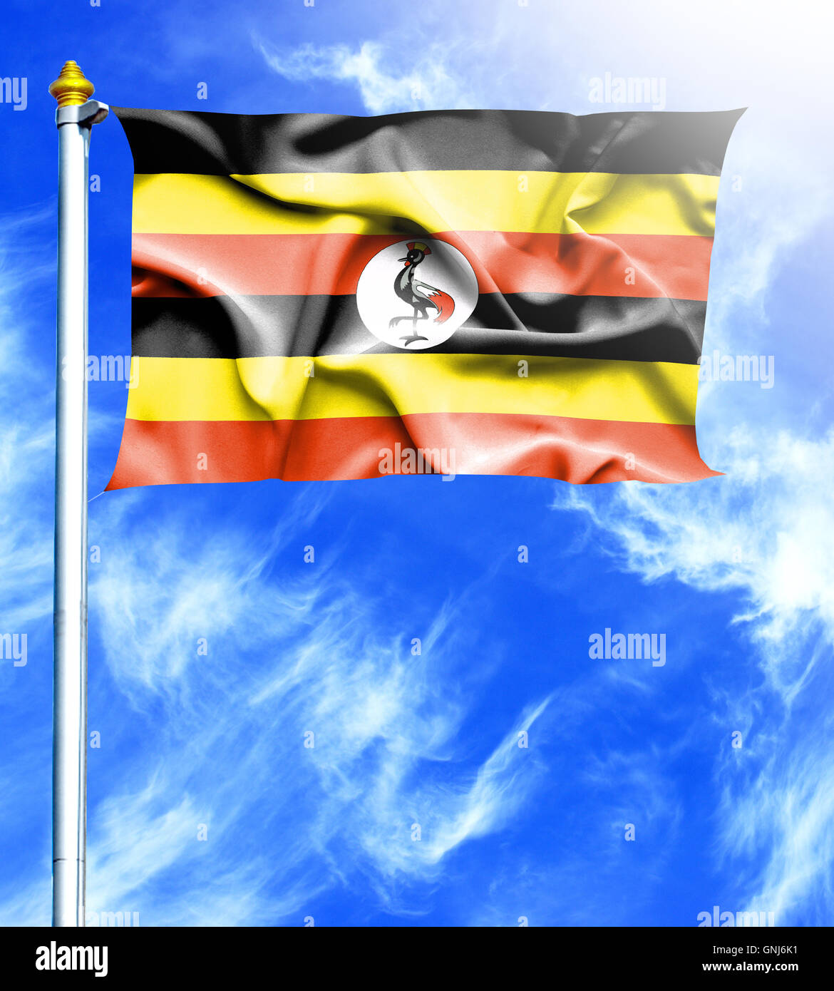 Blue sky and mast with hanged waving flag of Uganda Stock Photo - Alamy