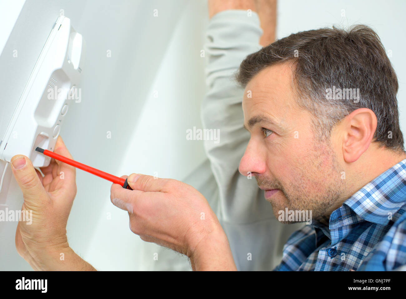 Repairing an intercom receiver Stock Photo - Alamy