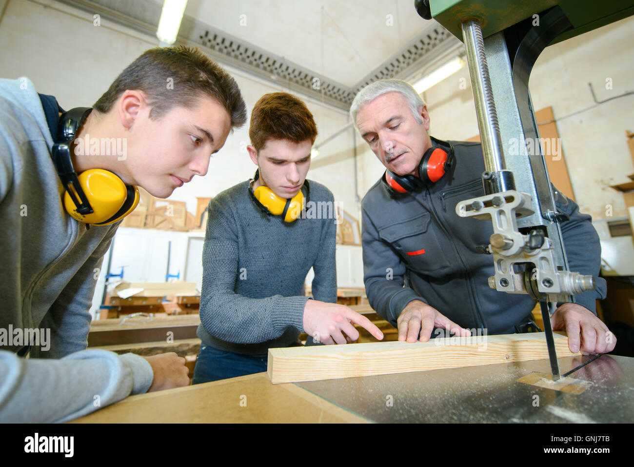 Male students in a woodwork class Stock Photo - Alamy