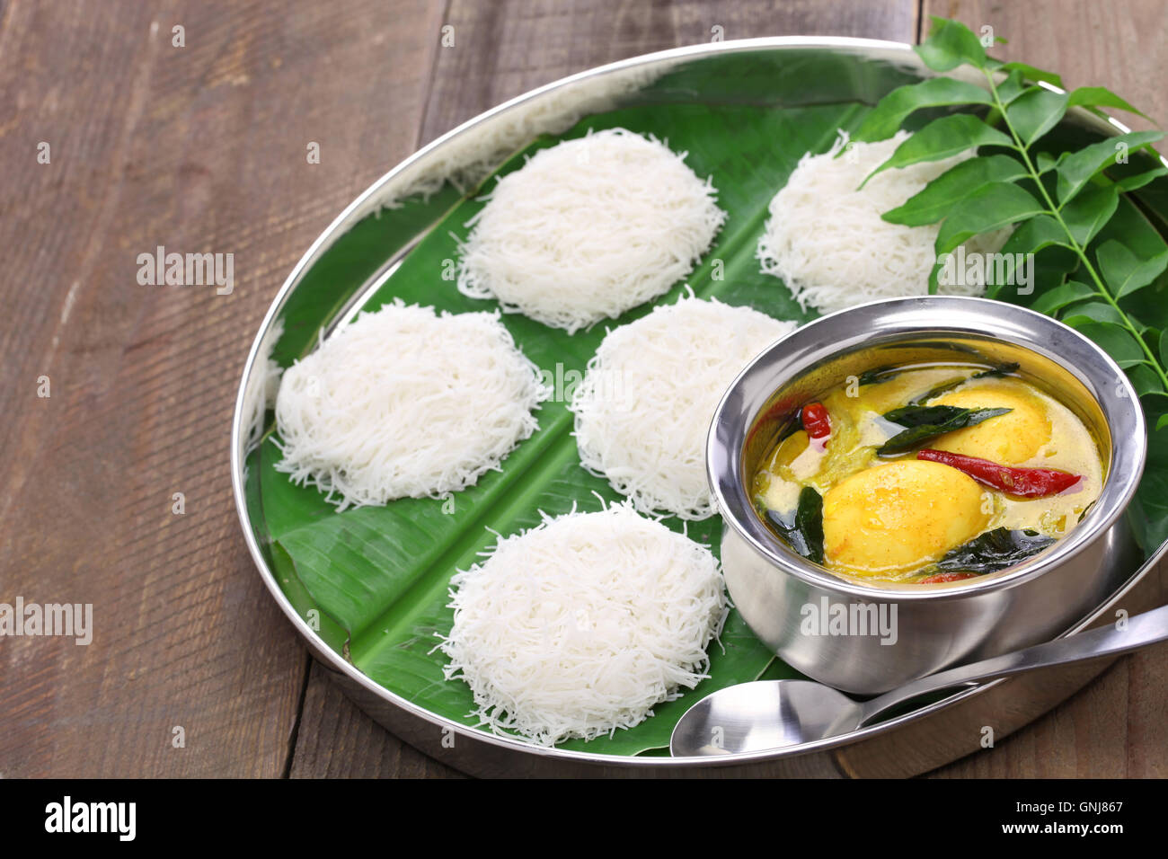idiyappam (string hoppers) with egg curry, south indian and sri lankan ...