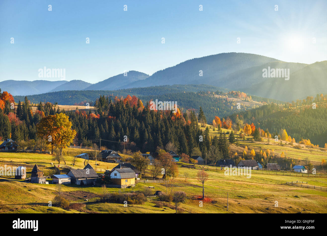 Landscape with village, mountains and blu sky Stock Photo - Alamy