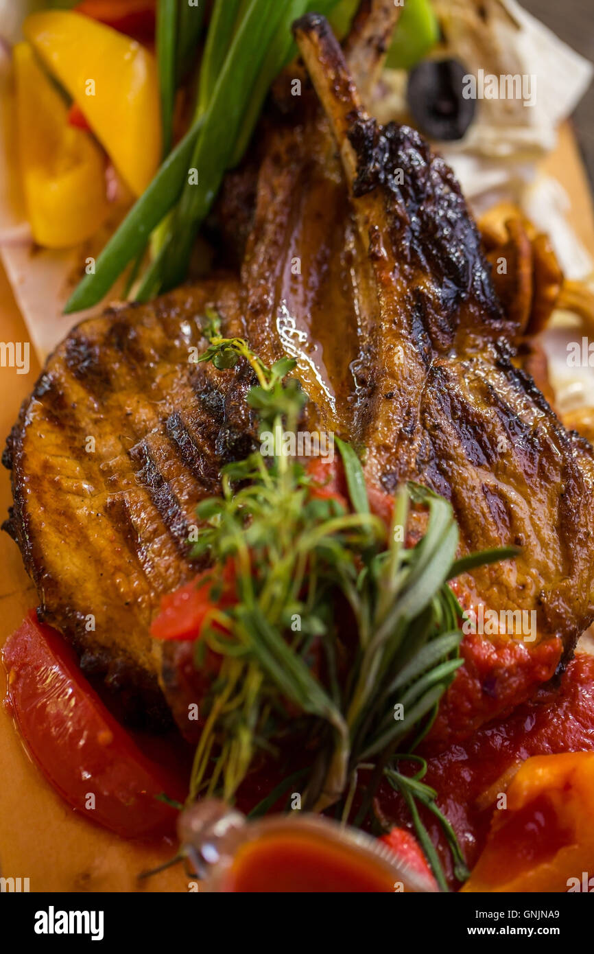 Cooked meat with herb Stock Photo - Alamy