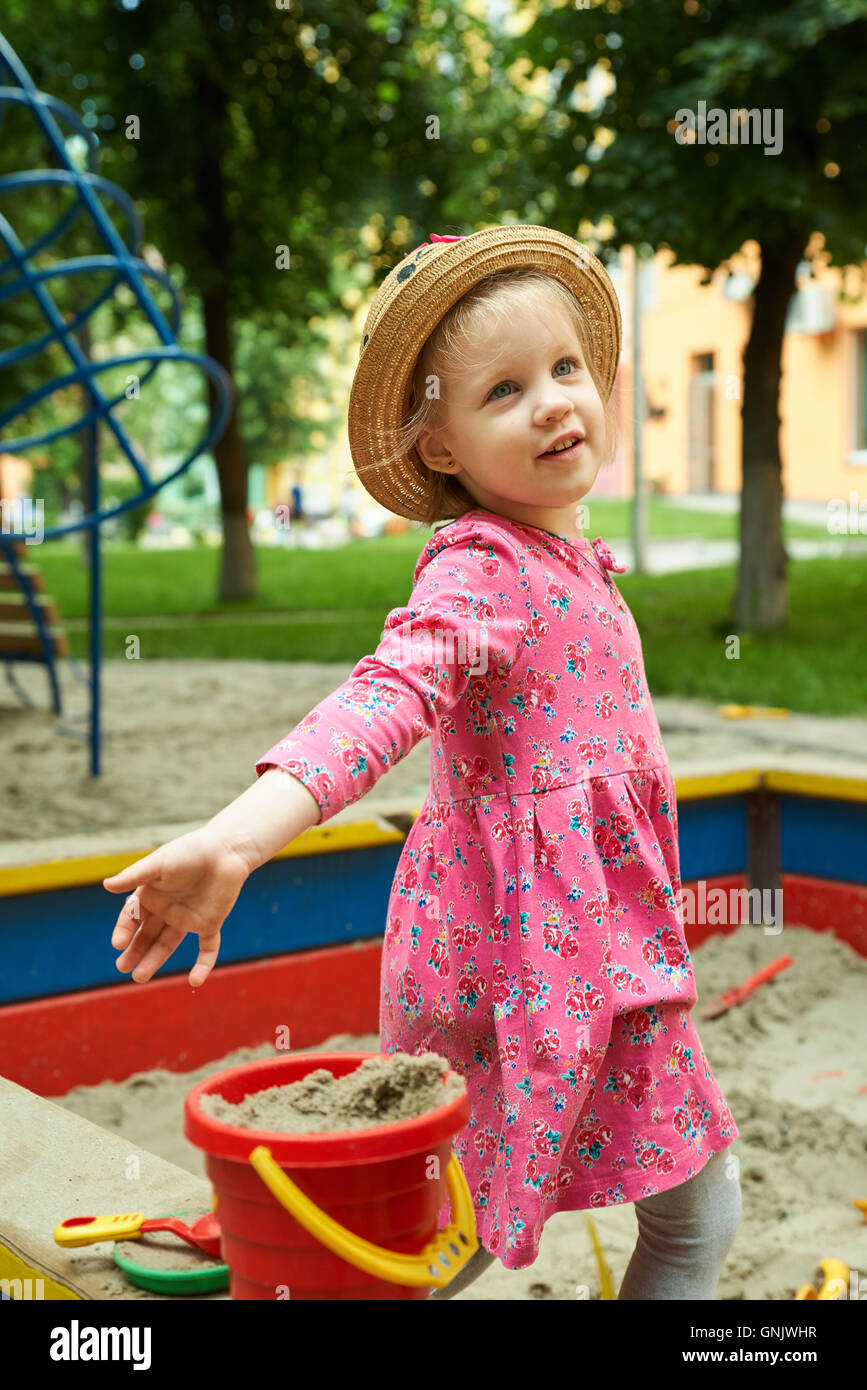 Child on playground in summer park Stock Photo - Alamy
