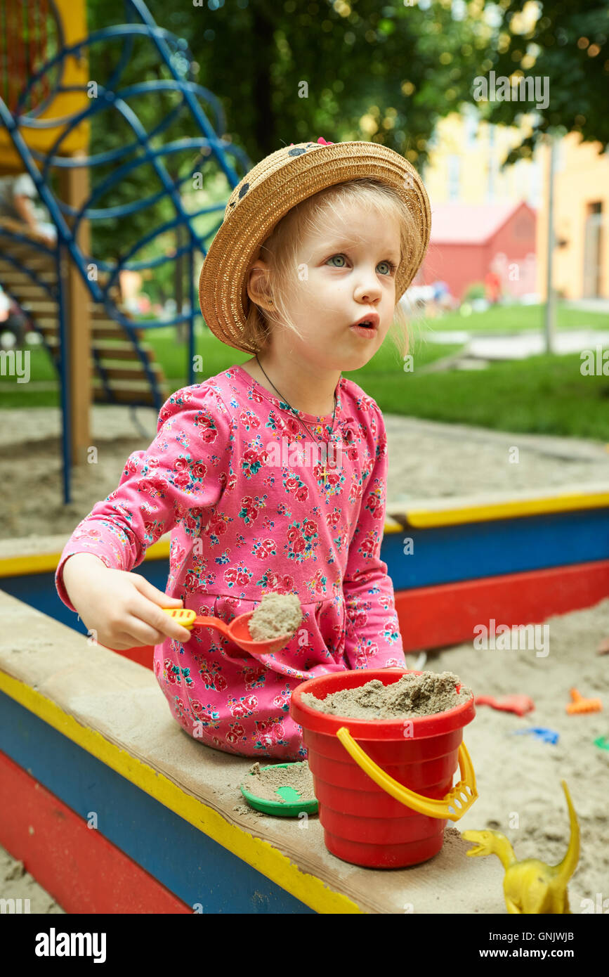 Child on playground in summer park Stock Photo - Alamy