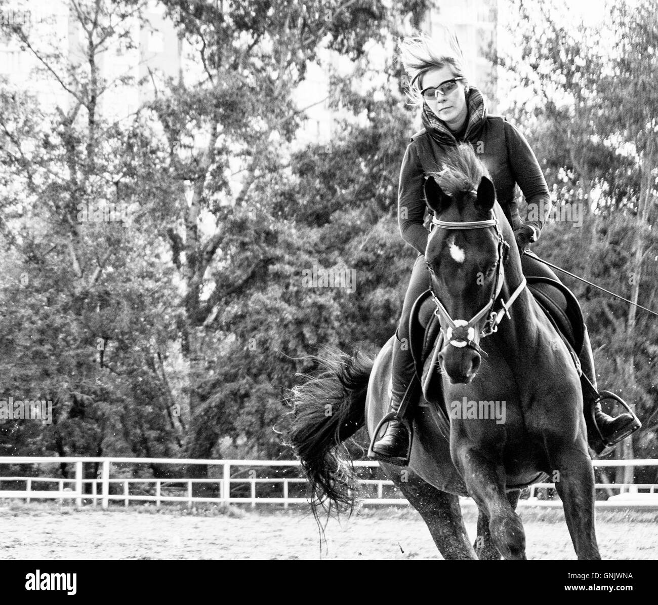 Woman horseback riding on beautiful Black and White Stock Photos ...