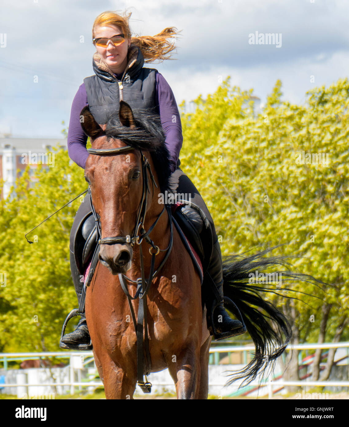 Girl riding a horse Stock Photo - Alamy