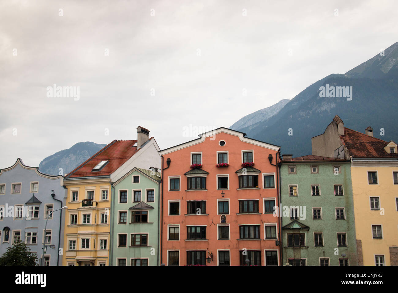 Facades of houses in the typical Austrian building style in Innsbruck ...