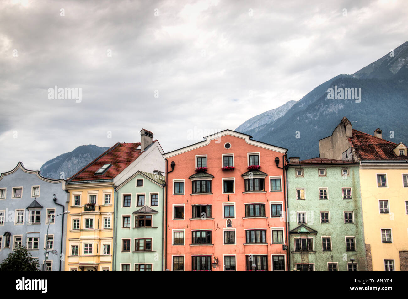 Facades of houses in the typical Austrian building style in Innsbruck ...