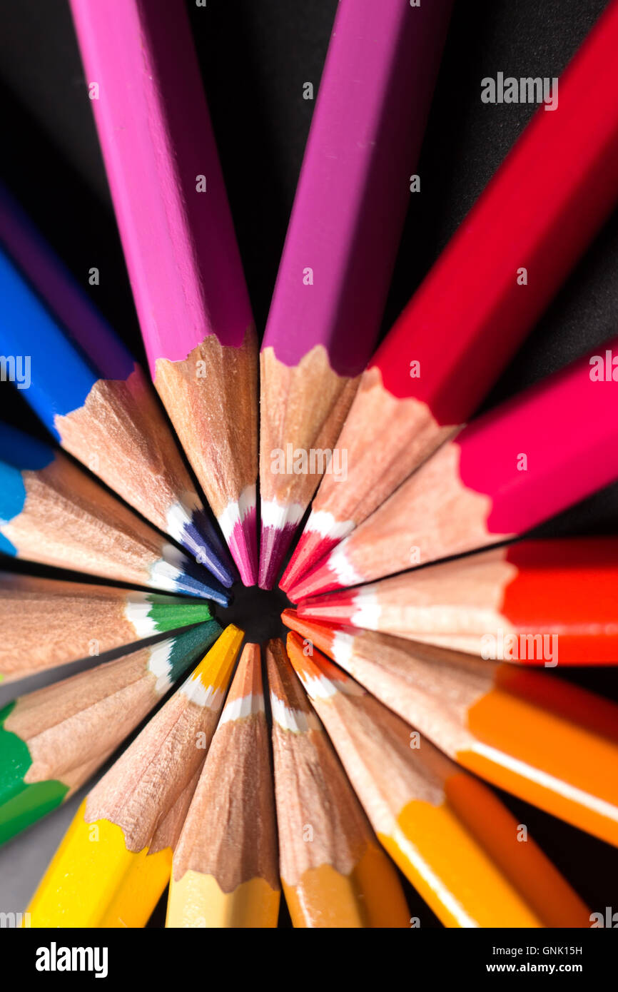 Color pencils in arrange in color wheel. Assortment of colored pencils ...
