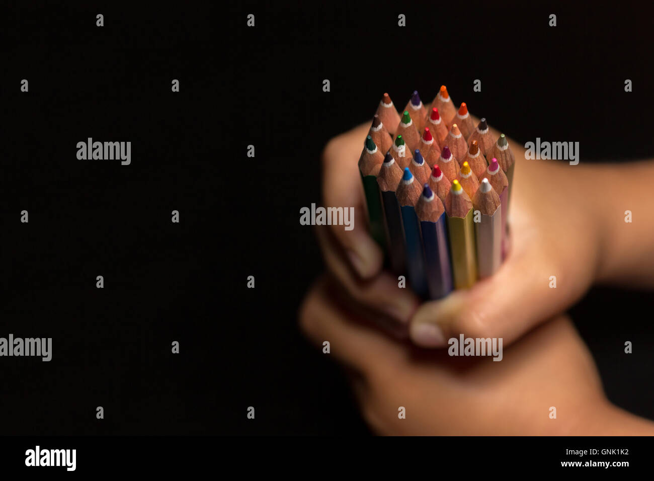 Child's hands with pencils, back to school. Child's hands with lots of ...