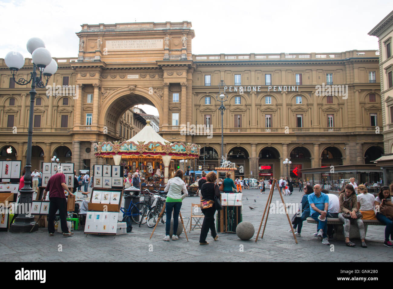 FLORENCE, ITALY - JULY 2016: A painter on a cosy historical square in ...