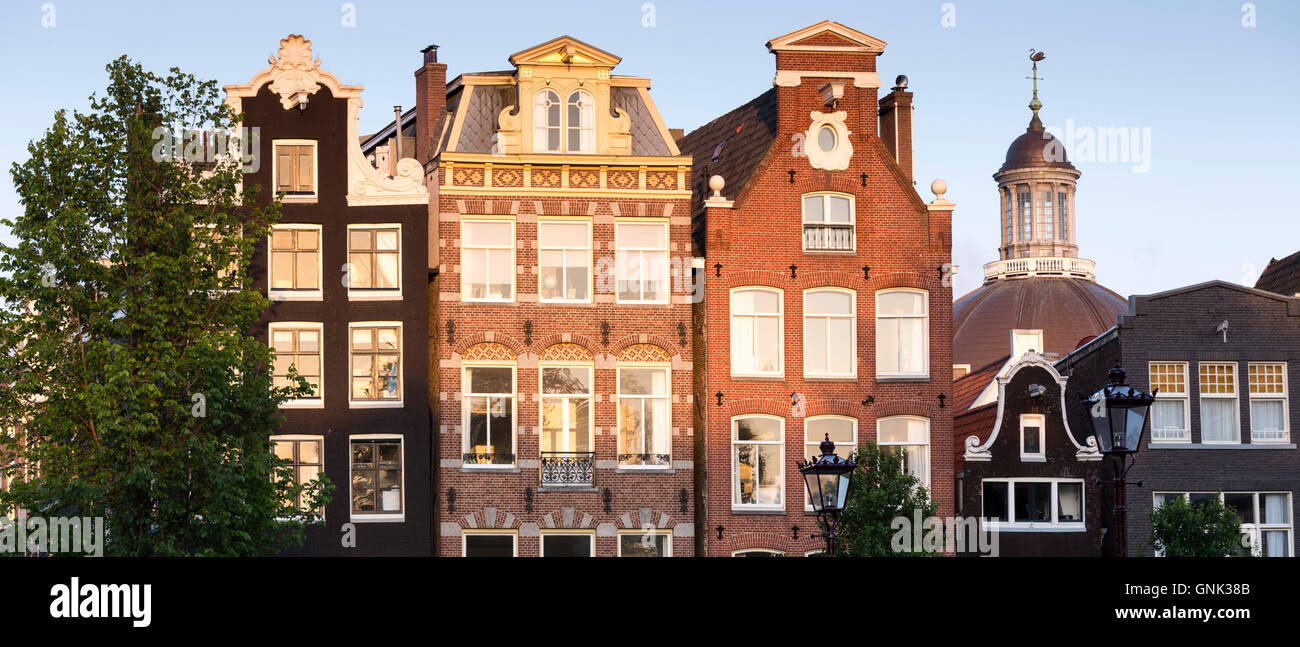 Gables of traditional Dutch architecture of canalside buildings in ...