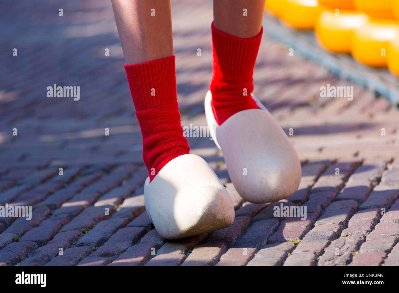 Dutch clogs traditional shoes and socks worn by woman Kaasmeisje ...