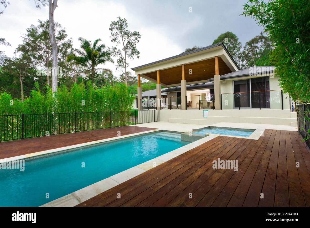 Modern backyard with pool Stock Photo - Alamy
