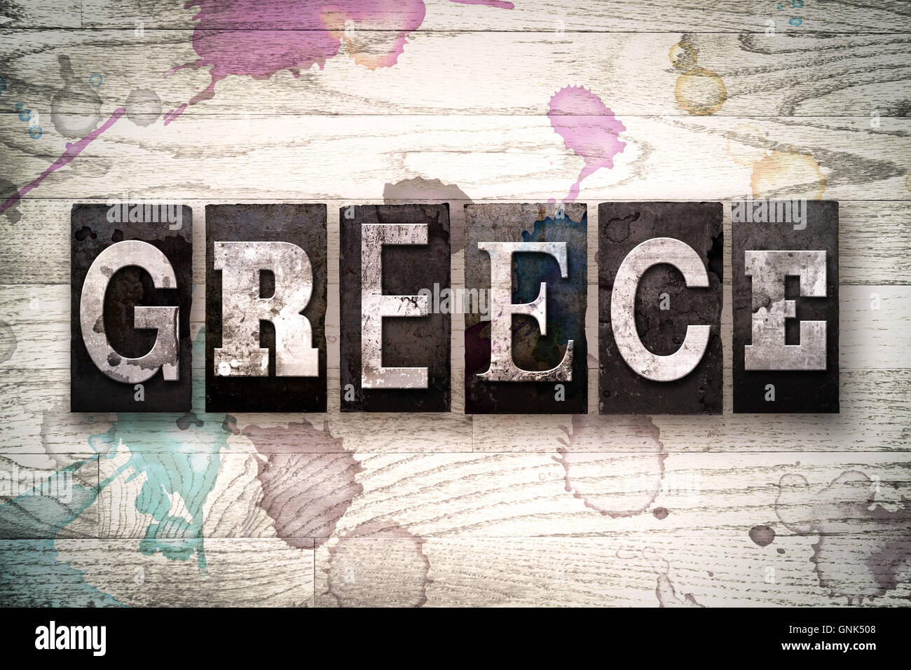 The word "GREECE" written in vintage, dirty metal letterpress type on a ...