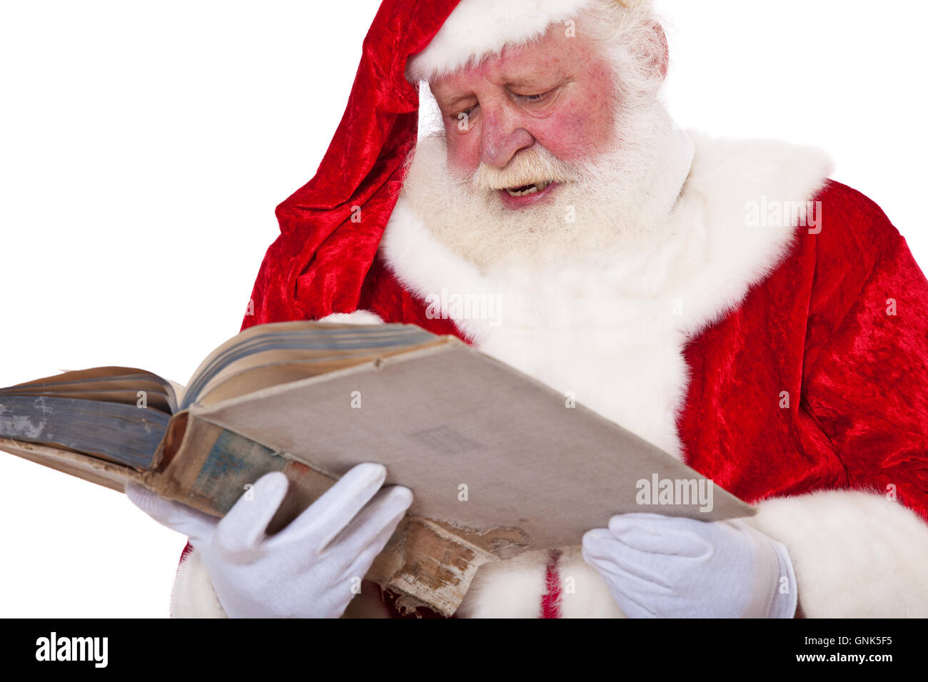 Santa claus reading in book hi-res stock photography and images - Alamy
