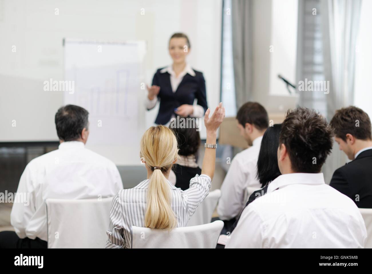 business woman giving presentation Stock Photo - Alamy
