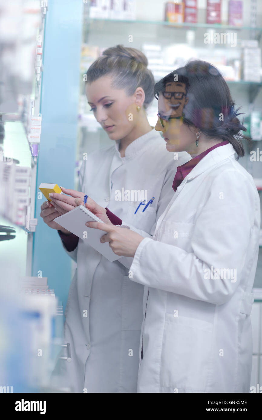 team of pharmacist chemist woman in pharmacy drugstore Stock Photo - Alamy