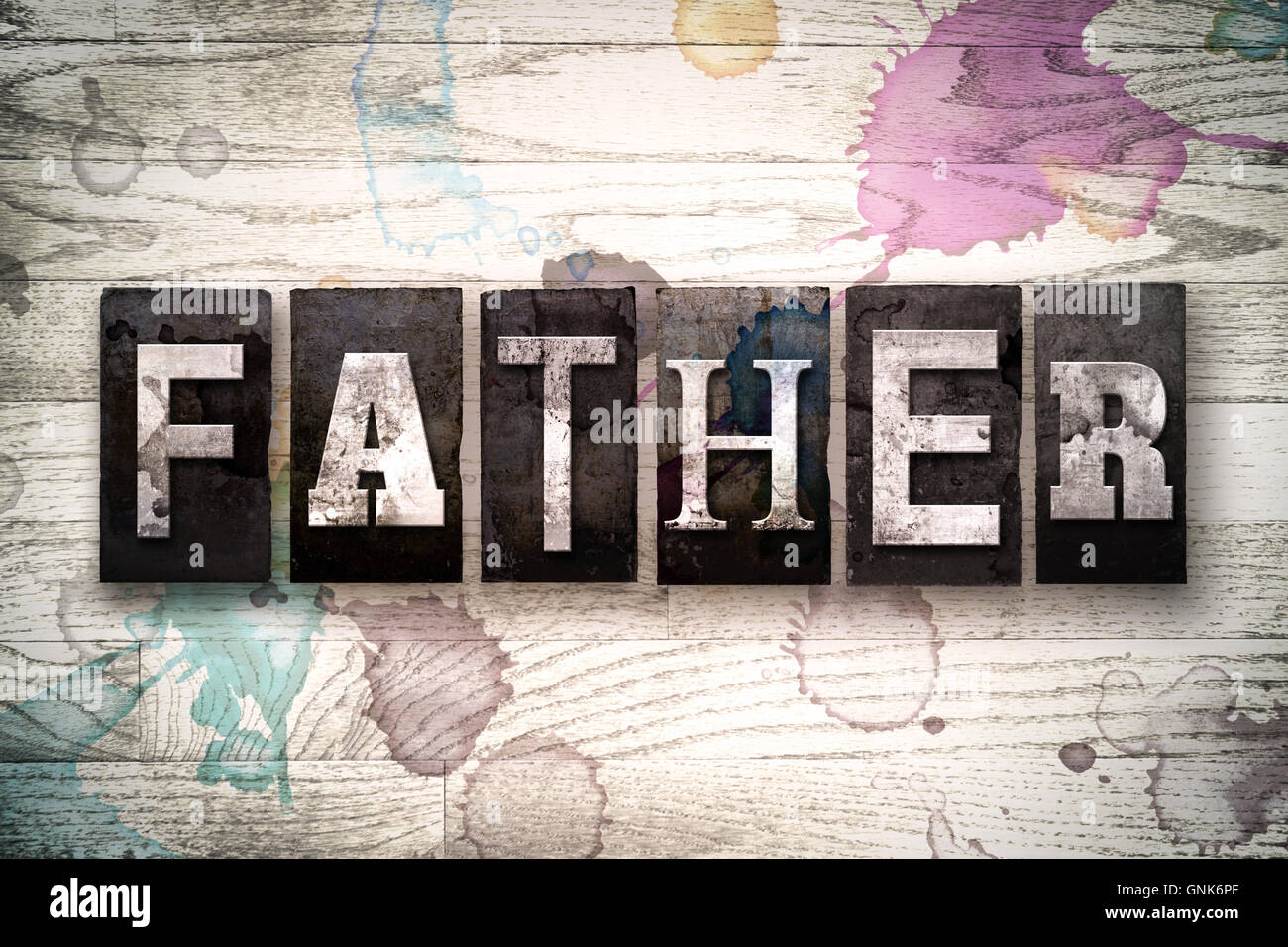 The word "FATHER" written in vintage, dirty metal letterpress type on a ...
