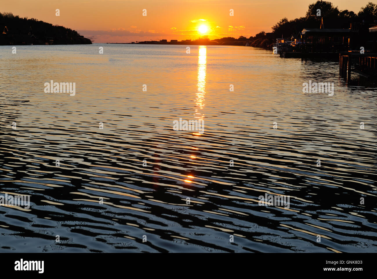 sunset on river Stock Photo - Alamy