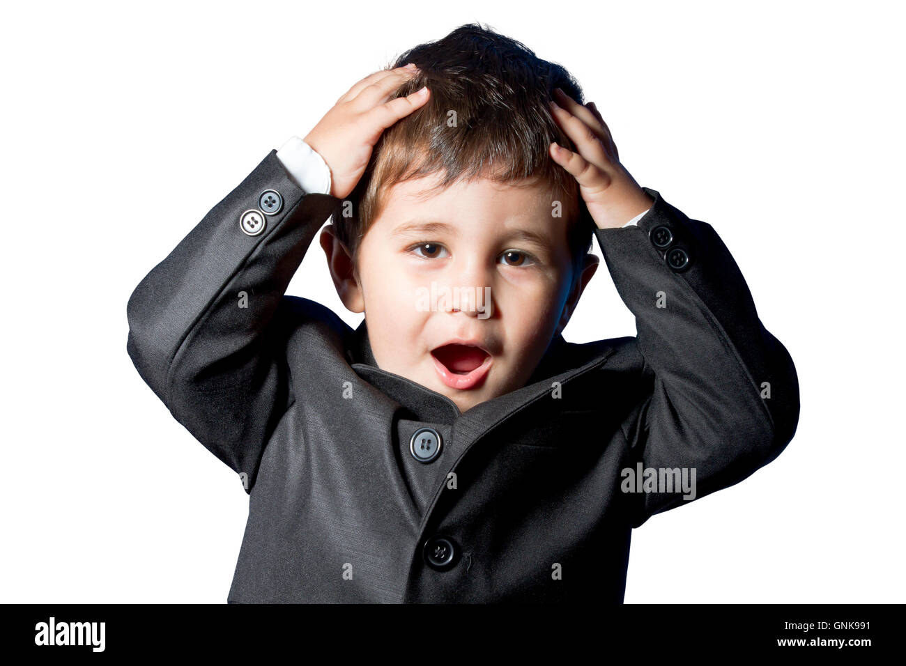 Funny child, baby dressed in suit and tie with fun face Stock Photo - Alamy