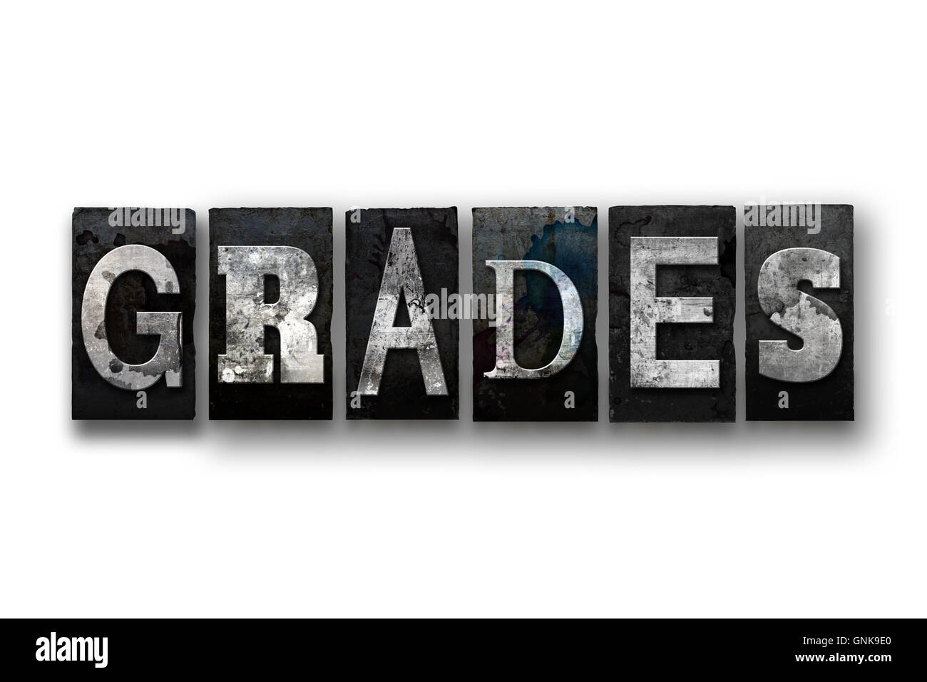 The word "GRADES" written in vintage, dirty, ink stained letterpress ...