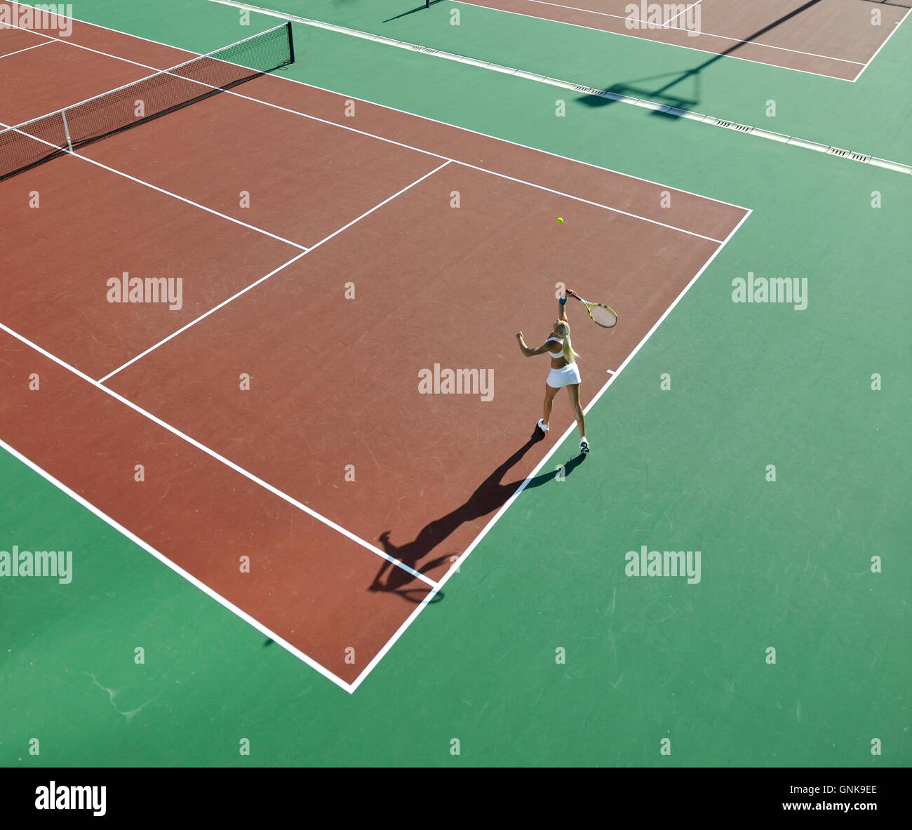 young woman play tennis outdoor Stock Photo - Alamy