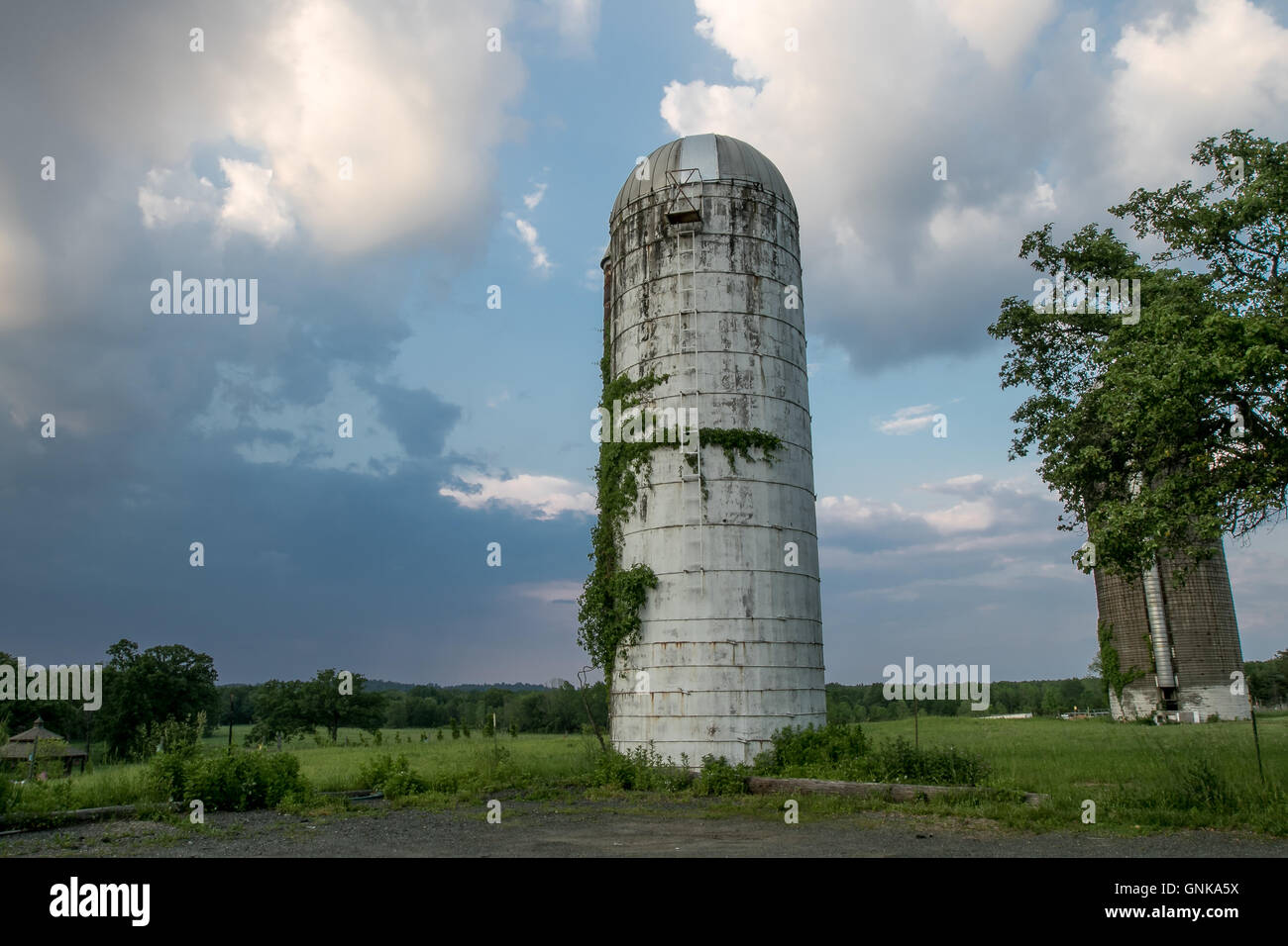An old abandoned silo in a field Stock Photo - Alamy