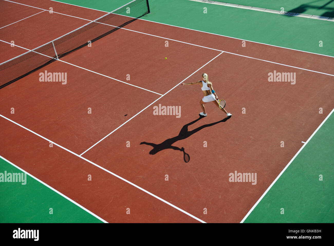 young woman play tennis outdoor Stock Photo - Alamy