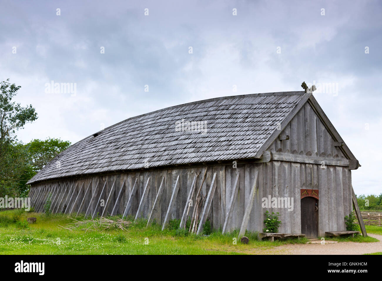 Historic viking longhouse reconstruction with oak shingles roof at Ribe ...