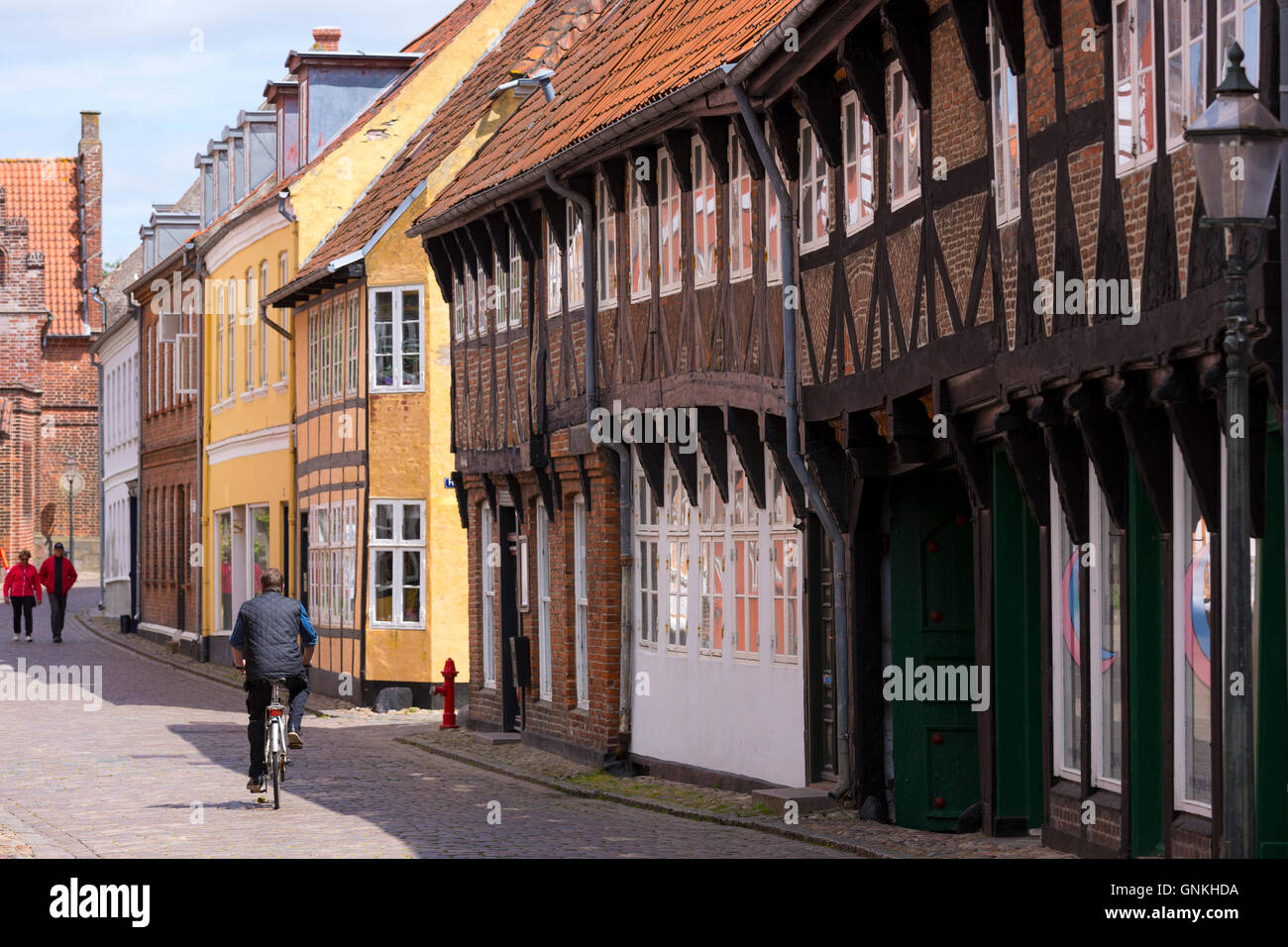 Locals in medieval street in Ribe centre, South Jutland, Denmark Stock ...