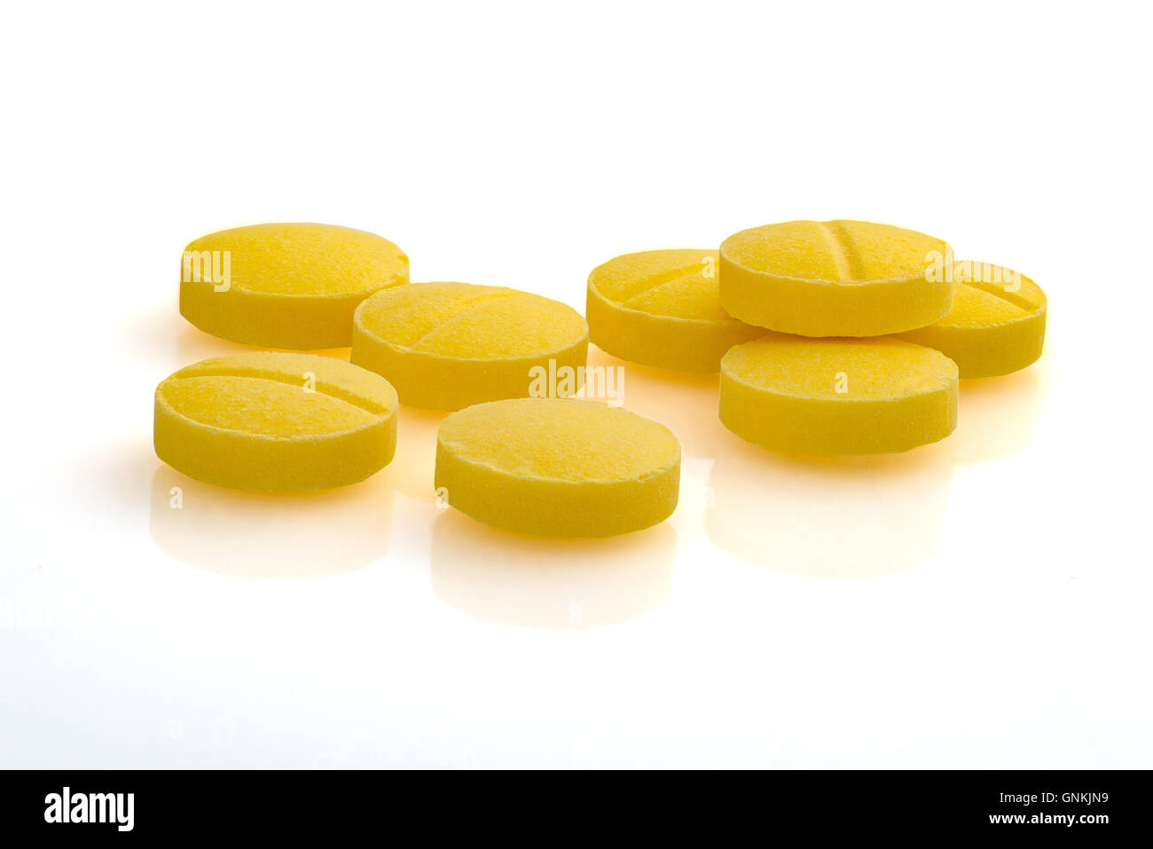 Yellow medicine close up macro photography drug on white background ...
