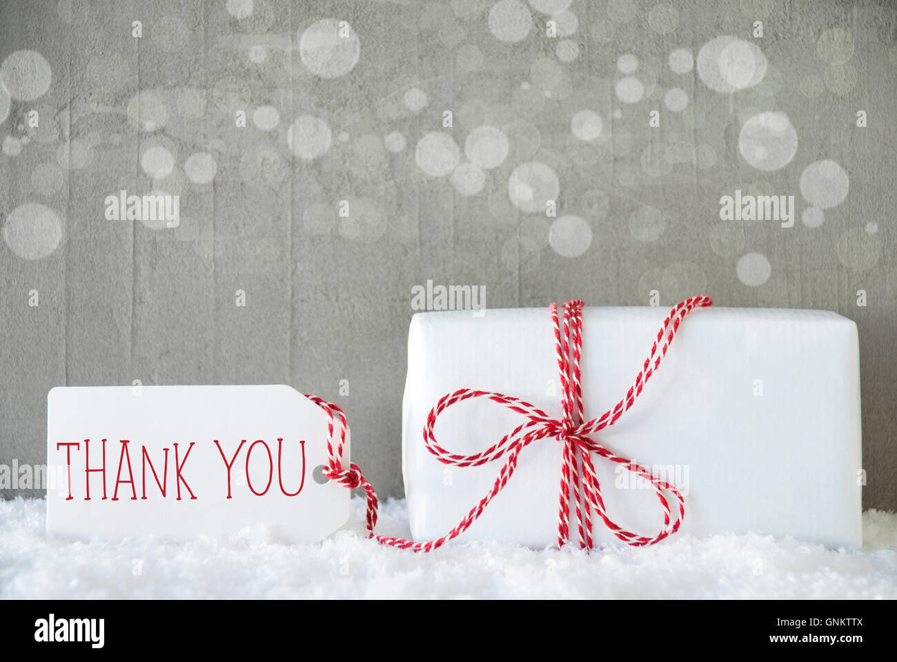 Gift, Cement Background With Bokeh, Text Thank You Stock Photo - Alamy