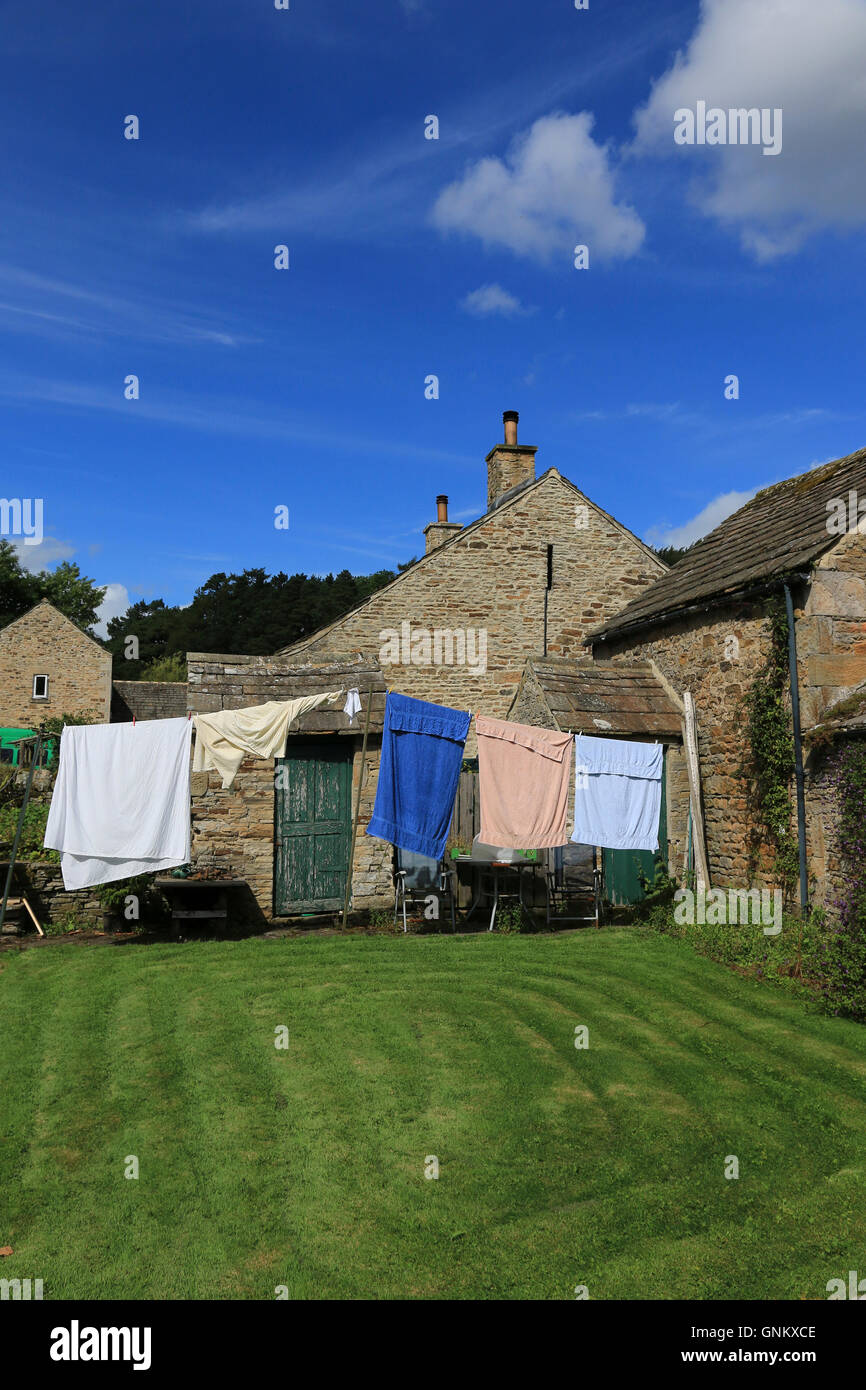 Laundry hanging outside to dry on a washing line on a sunny day Stock ...