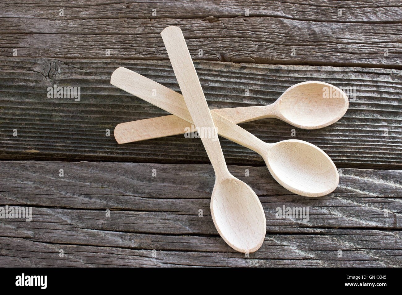 Wooden spoons on table Stock Photo - Alamy