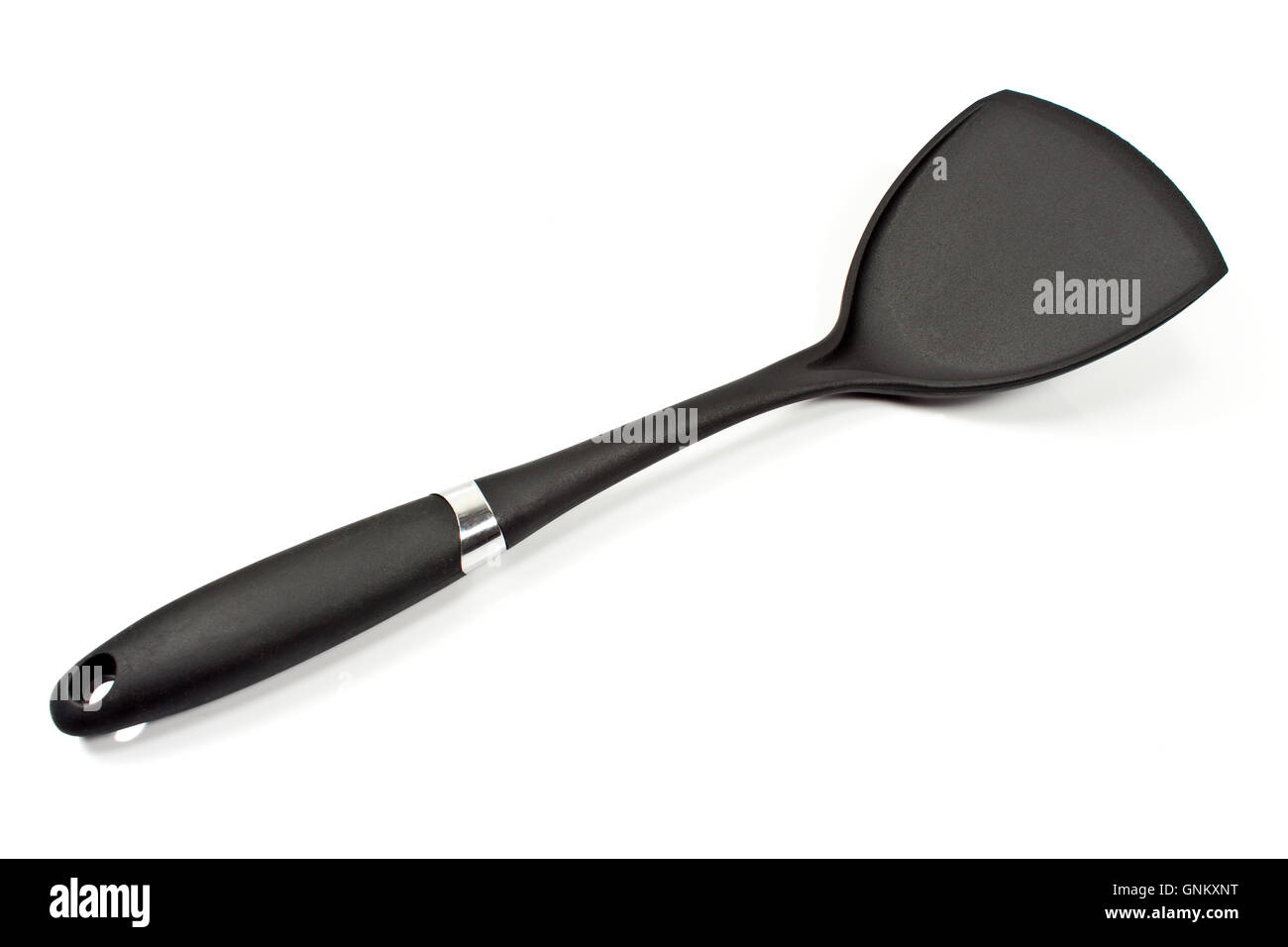 Black plastic kitchen spatula isolated on white Stock Photo - Alamy