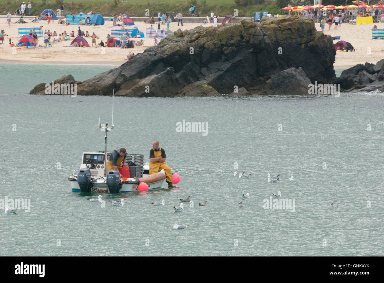 Fishermen in St Ives Cornwall Stock Photo - Alamy